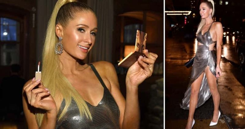Paris Hilton suffers wardrobe malfunction as she exposes too much in metallic dress with ...