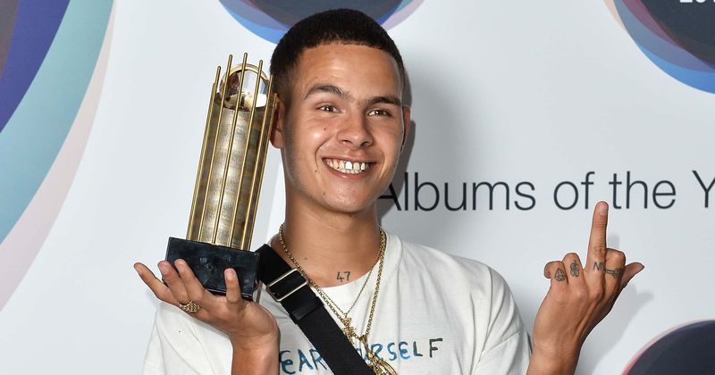 Rapper Slowthai jumps off stage and spits in lovetsruck fan's mouth ...