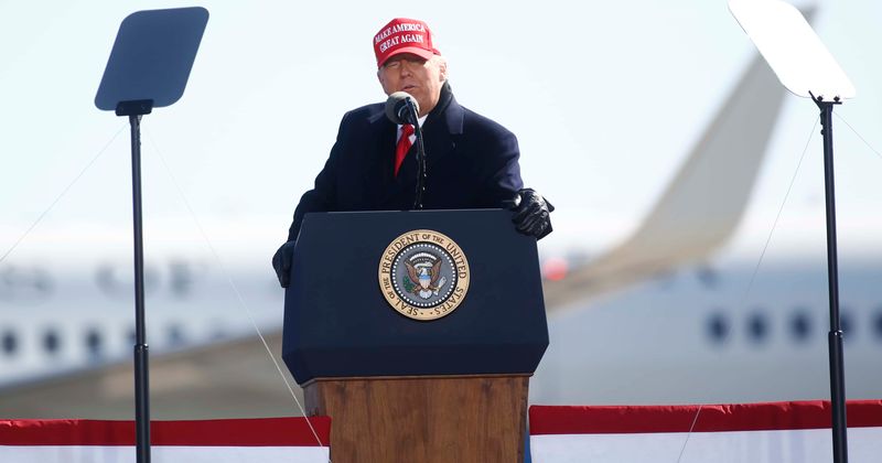 Trump dons high-neck coat and gloves at North Carolina rally, Internet ...