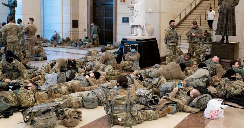 Why were National Guardsmen made to sleep on garage floor? Soldier says ...